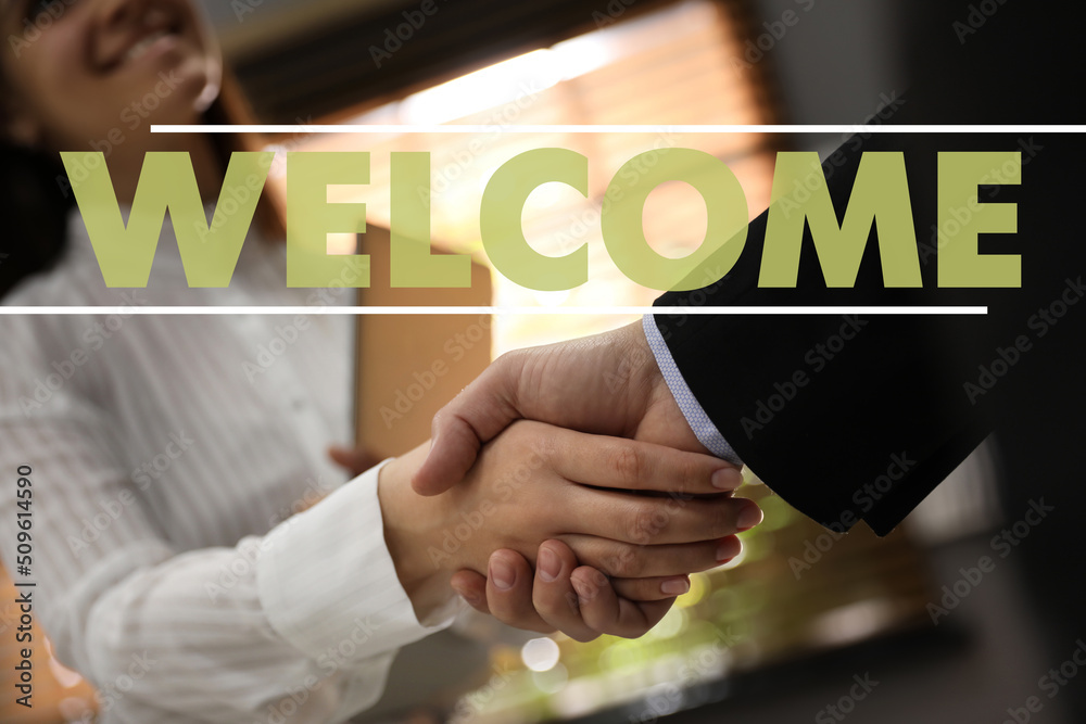 Welcome to team. Employee shaking hands with intern in office, closeup ...