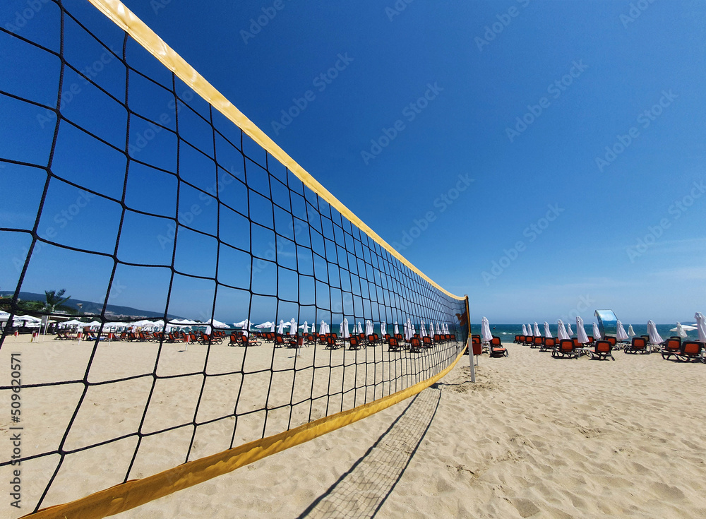 Volleyball net on the beach in the sea resort Stock Photo | Adobe Stock