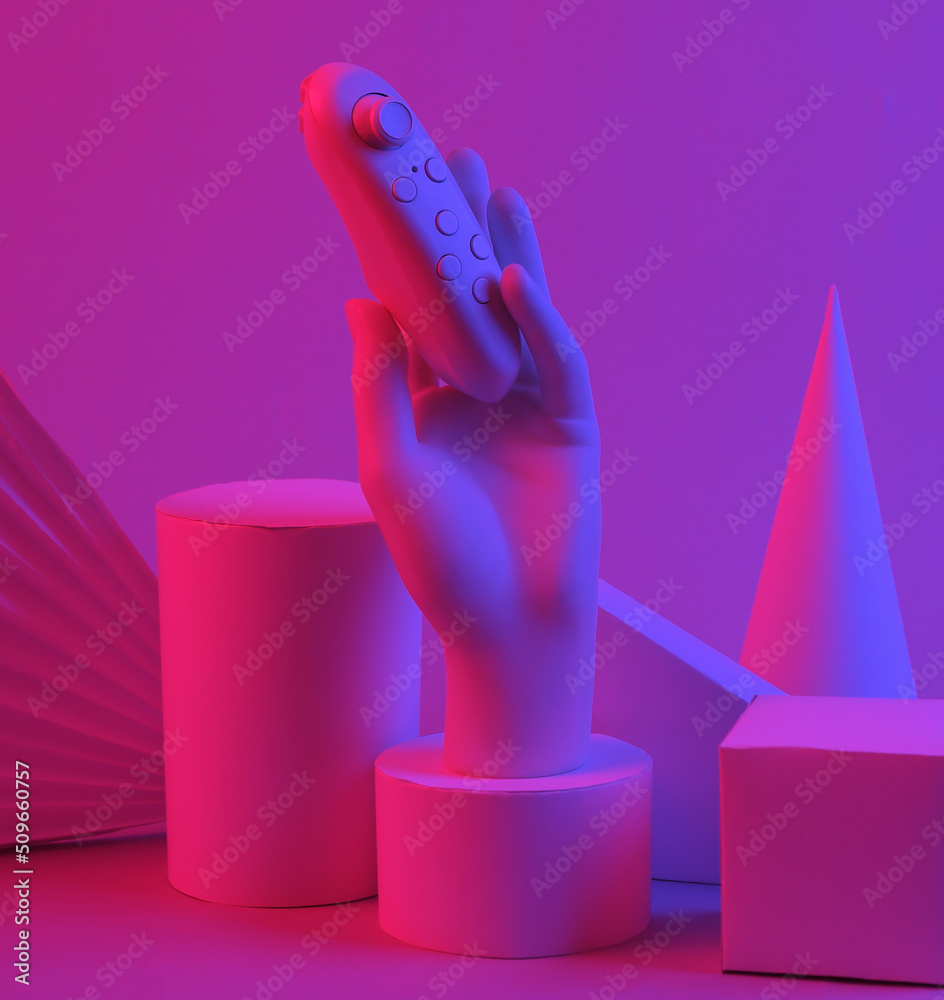 Hand holding modern joystick, Geometric shapes in red-blue gradient ...