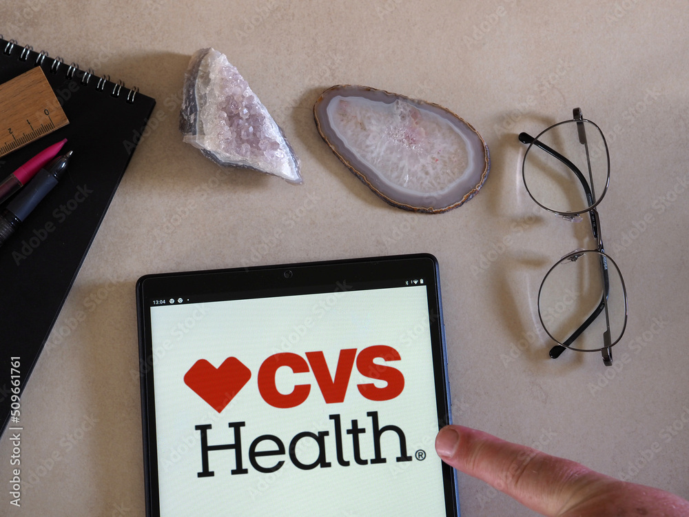 In this photo illustration CVS Health logo seen displayed on a tablet ...