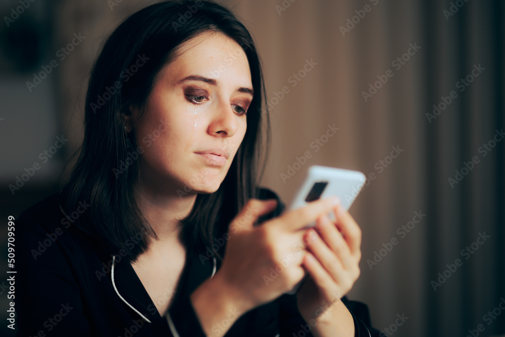 Crying Woman Reading a Sad Text Message on her Phone. Girlfriend ...