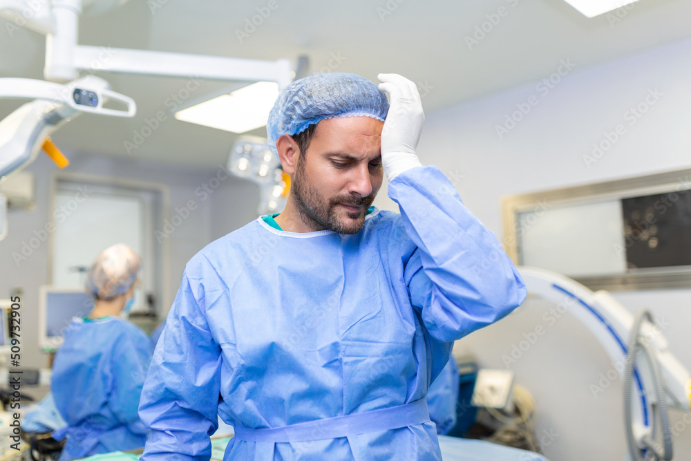Failure! Sad Surgeon crying. He is feeling sad and tired after ...