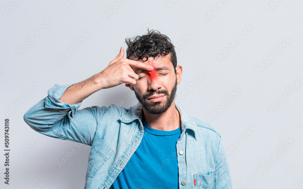 Young man with pain touching nose. A person with nasal bridge pain, Man ...