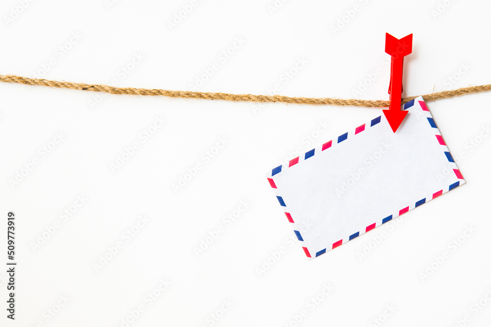 Abstract Hemp rope striped red arrow on envelope with white background ...