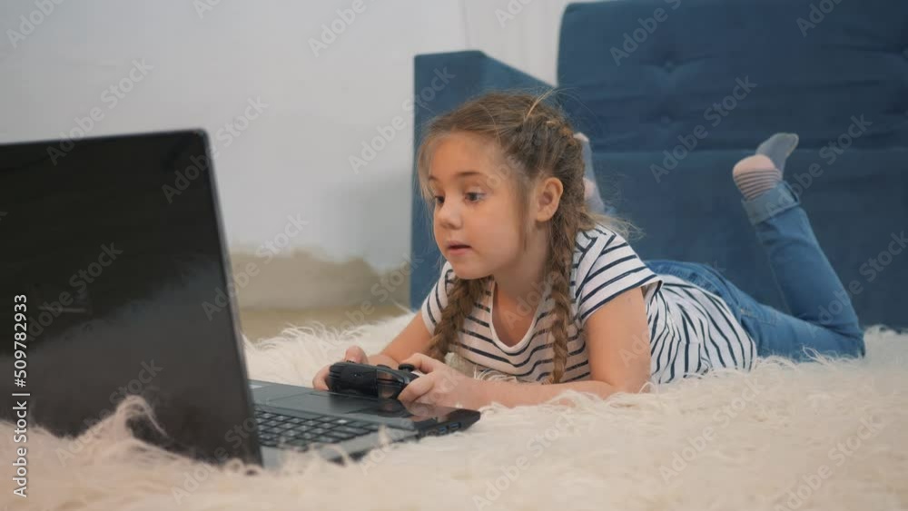 Vidéo Stock People playing video games. Happy cute kid gamer playing ...