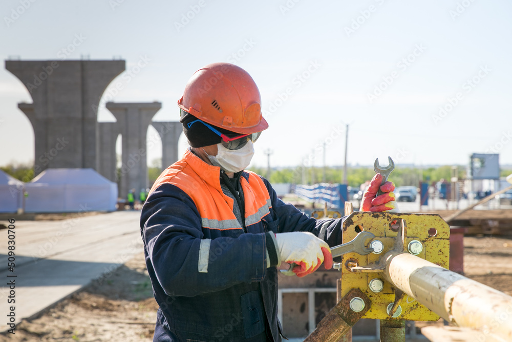 Worker install Tightening bolts & Nuts of piping Flange system. In the ...