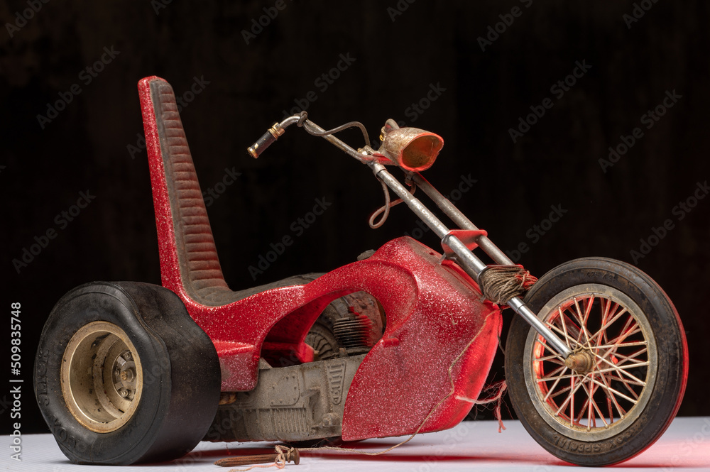Vintage antique red sparkle toy chopper, trike, three wheeled cox motor ...
