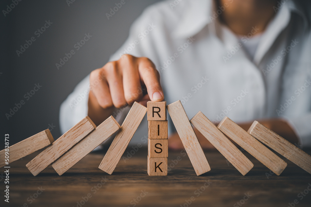 close-up hand The hand of a businessman who is stopping or preventing a ...