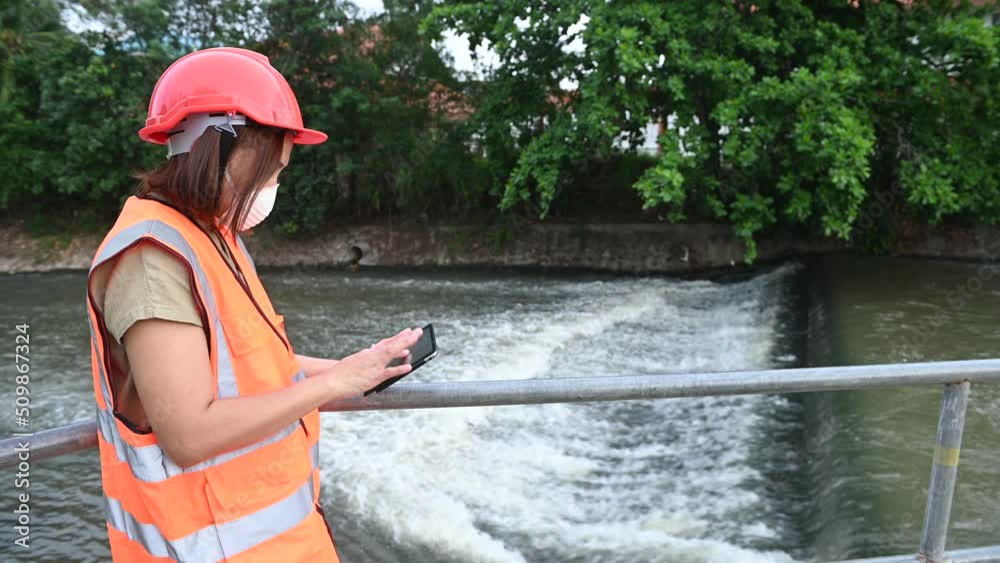 Asian Female engineering working at sewage treatment plant,Marine ...