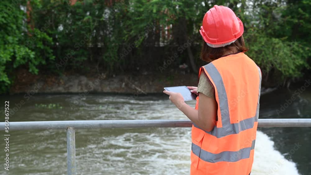 Asian Female engineering working at sewage treatment plant,Marine ...