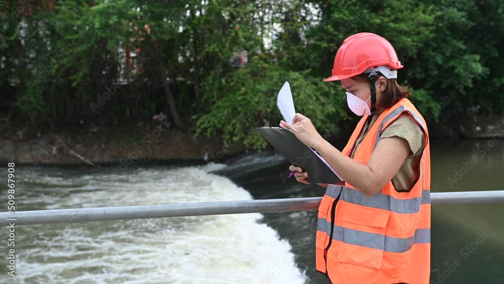 Asian Female engineering working at sewage treatment plant,Marine ...