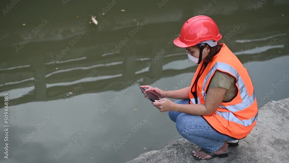 Asian Female engineering working at sewage treatment plant,Marine ...