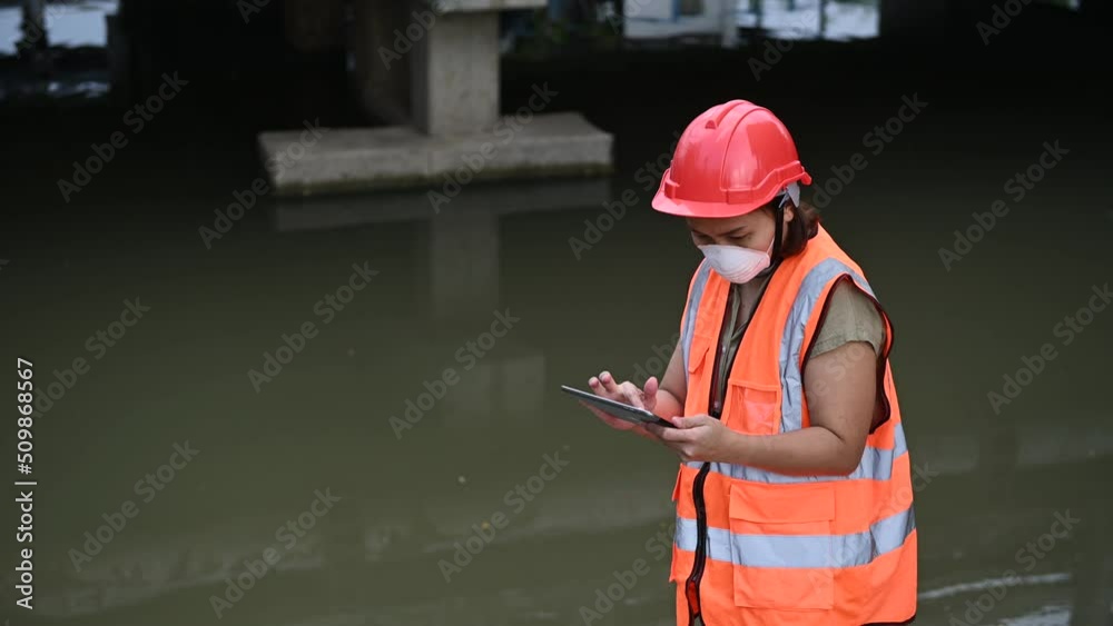 Asian Female engineering working at sewage treatment plant,Marine ...