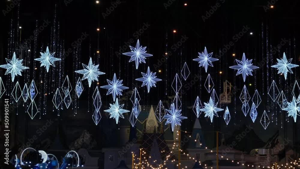 Shining light installation. Christmas decorations. Electric garlands in ...