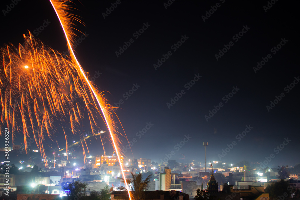 Wide angle shot of fire works in the city during the Diwali festival in ...