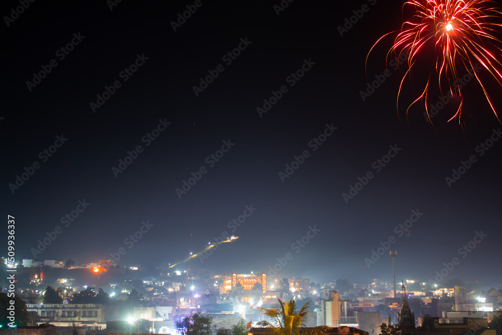 Wide angle shot of fire works in the city during the Diwali festival in ...