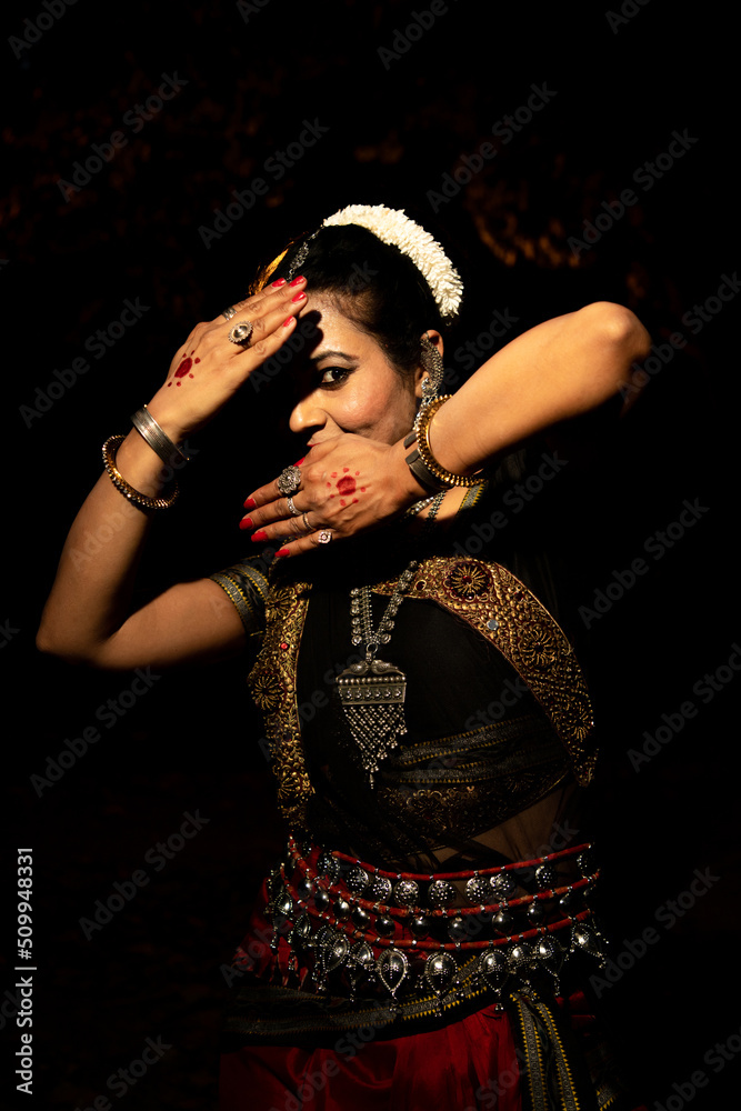 Indian woman Odissi dancer doing classical dance form. Orissi dance ...