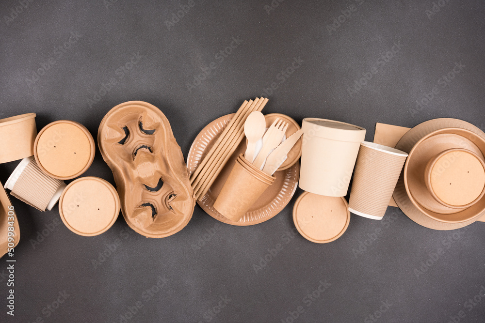 Different eco paper tableware and utensils - paper cups, containers ...