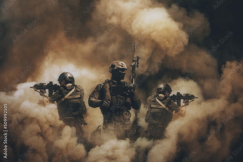 Swat forces between smoke and gas in battle field Stock Photo | Adobe Stock