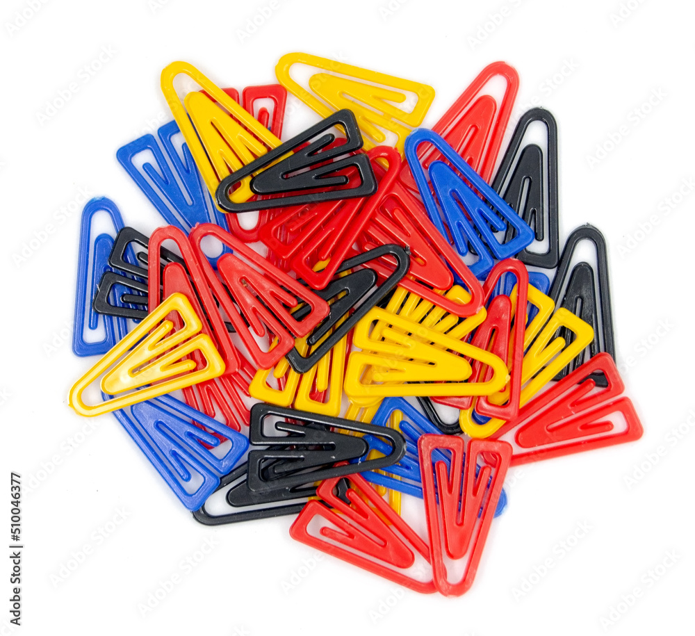 Colorful plastic paperclips isolated on white background, top view. Non ...