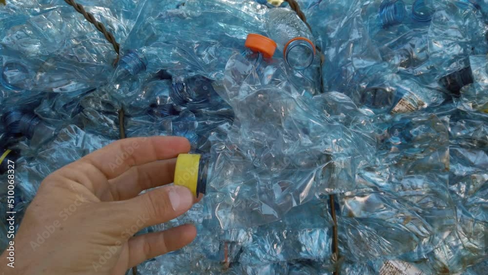 Video Stock Plastic bottles collected in the sea and stacked for ...