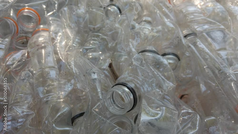 Plastic bottles collected in the sea and stacked for recycling ...