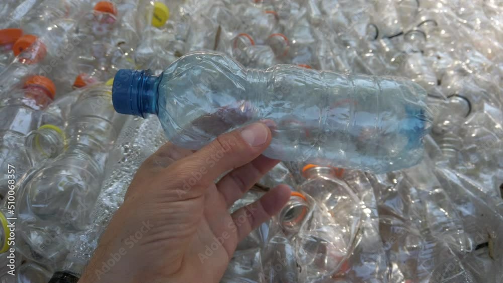 Plastic bottles collected in the sea and stacked for recycling ...