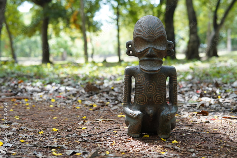 Taino Antique Stone Idol God Figure standing on the grown, close up ...