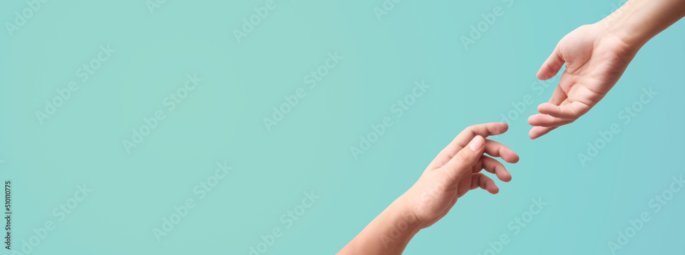 Two hands reaching out on blue background, help concept 스톡 사진 | Adobe Stock