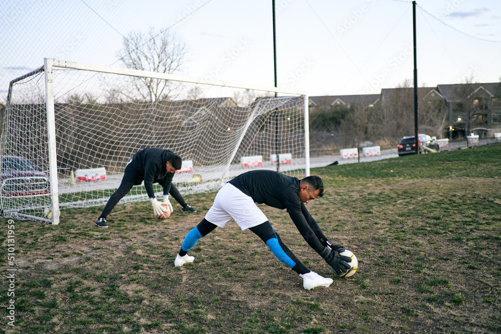 soccer goalkeepers stretching Stock Photo | Adobe Stock