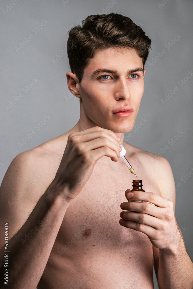 Serum dripping on male face, male skin care Stock Photo | Adobe Stock