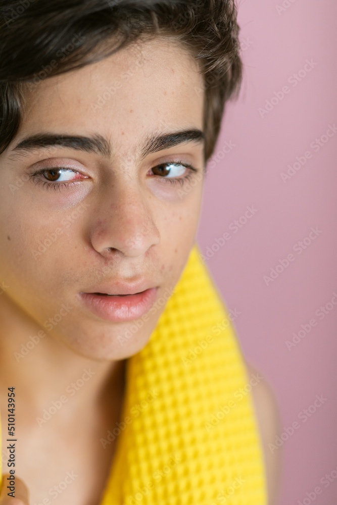 Teenage portrait in full puberty with yellow towel Stock Photo | Adobe ...