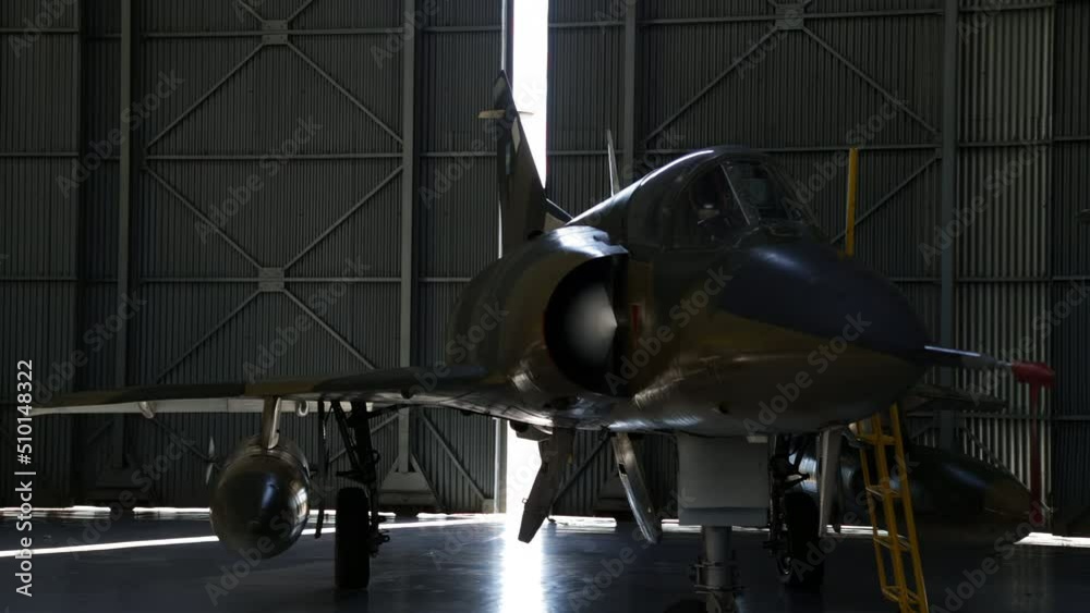Fighter Jet in Aircraft Hangar With Doors Opening - 4K Stock Video ...