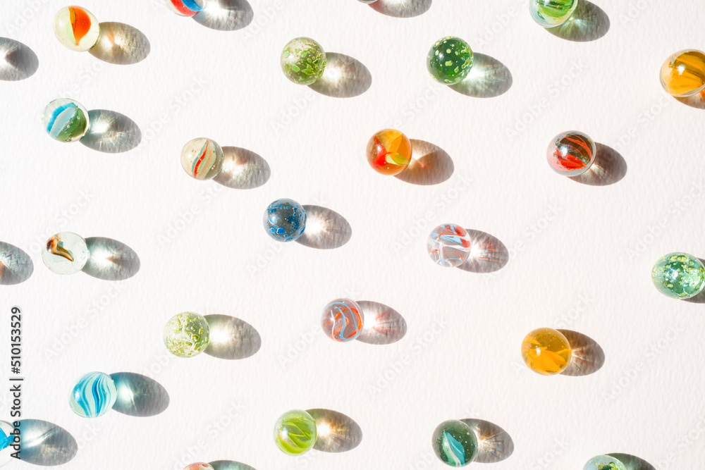 Glass marbles in bright sunlight Stock Photo | Adobe Stock