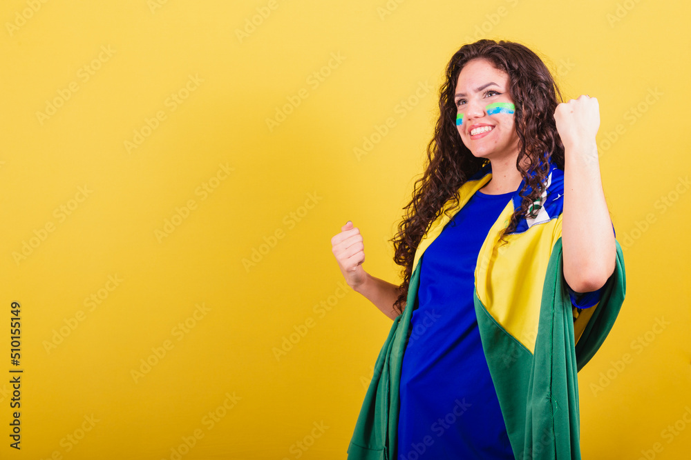 Soccer fan woman, brazil fan, world cup, closed fists, celebrating ...