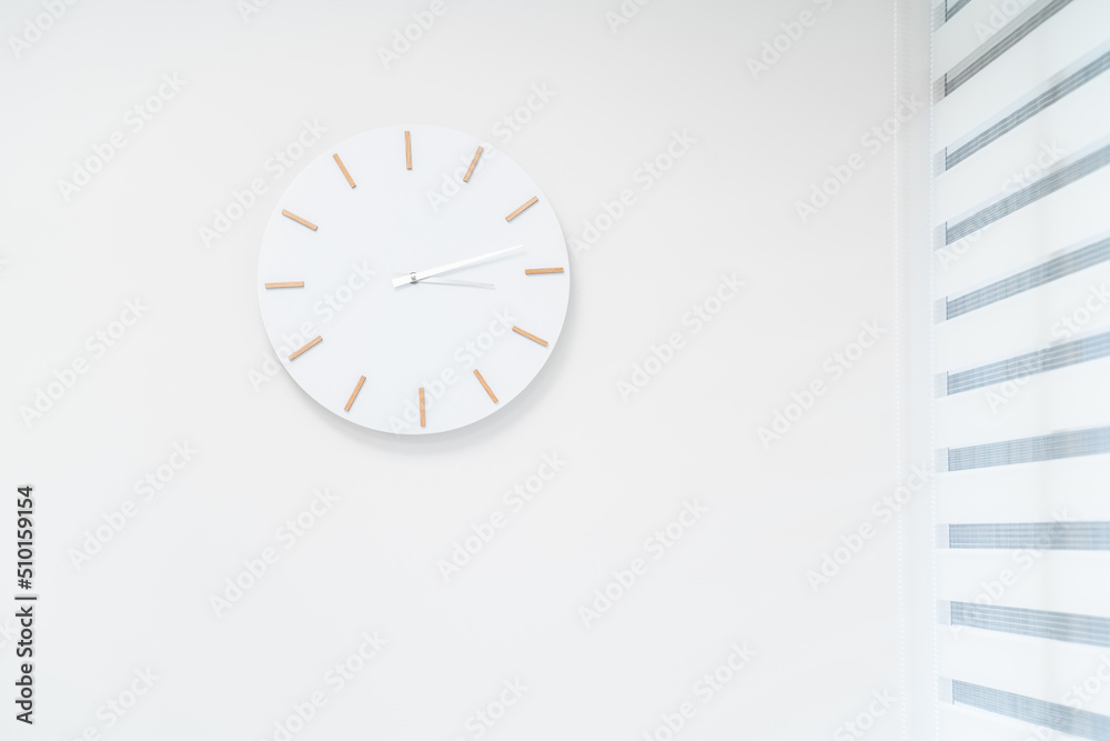 White Clock In White Wall Background Stock Photo | Adobe Stock