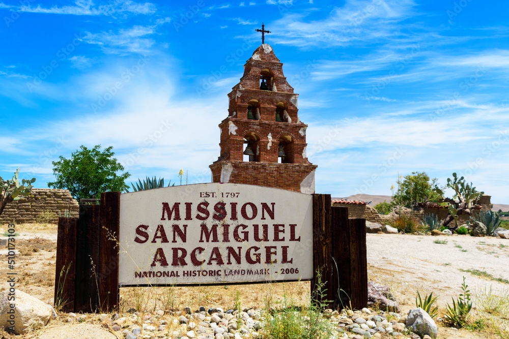 Mission San Miguel Arcangel sign and historic Bell Tower under ...