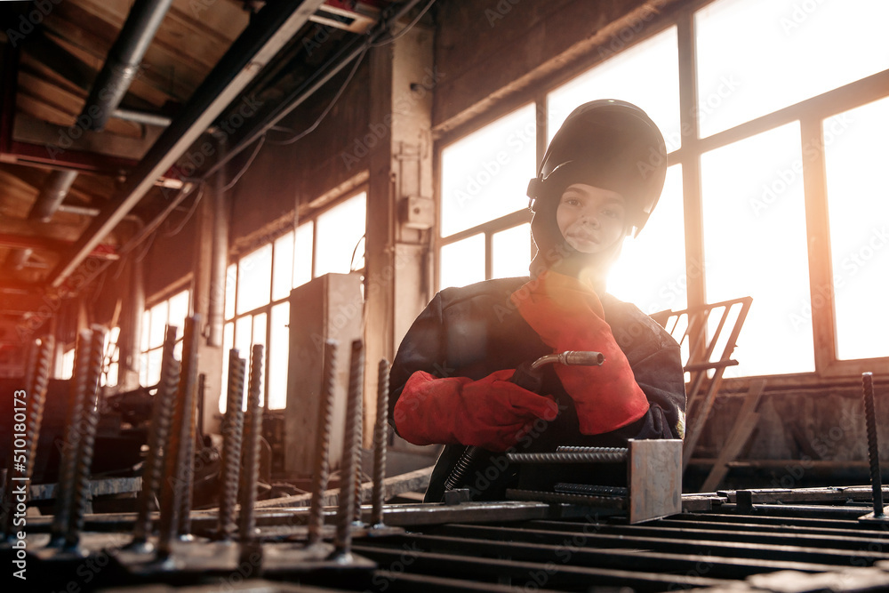 Portrait beautiful woman welder background industry factory workplace ...