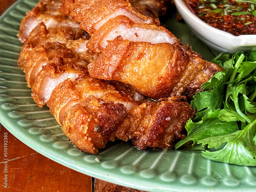 Deep-fried Pork Belly with Fish Sauce served with dipping sauce. Thai ...