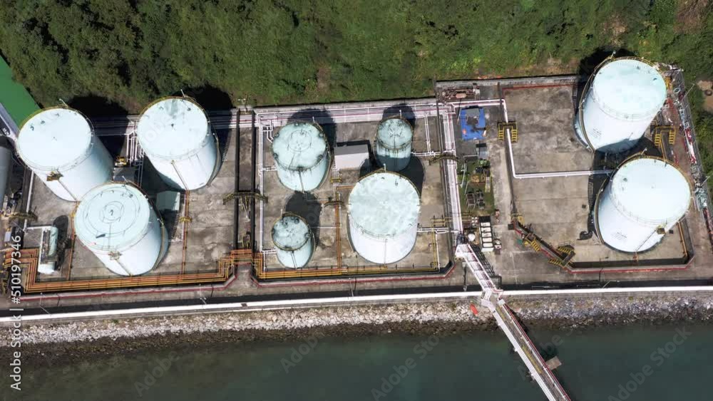 Aerial drone top view of tank farm oil and gas terminal with lots of ...