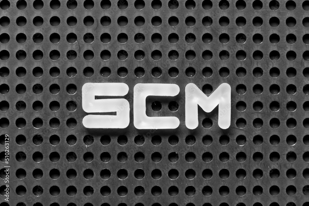 White alphabet letter in word SCM (Abbreviation of Supply chain ...