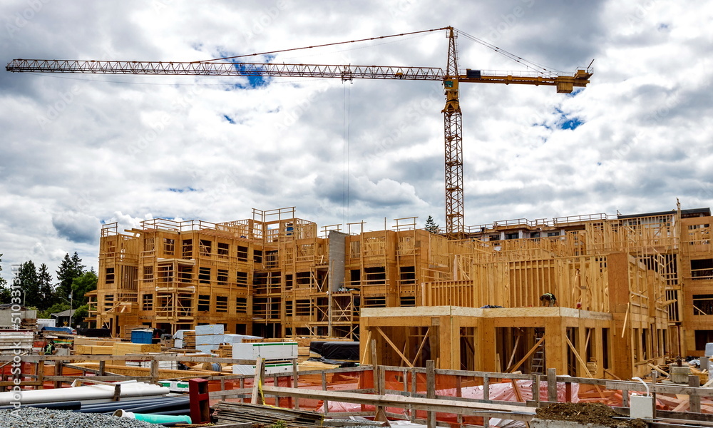 Construction of a new wooden building in a residential area of Richmond ...