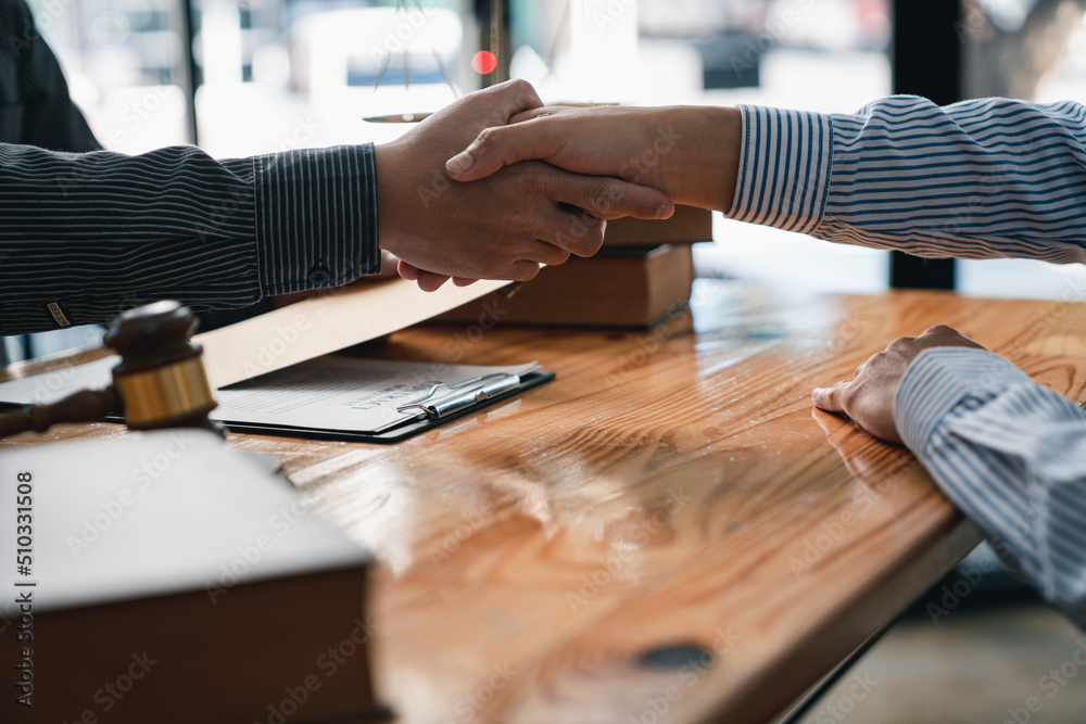 lawyer or judge shaking hands after agreeing to accept a bribe From ...