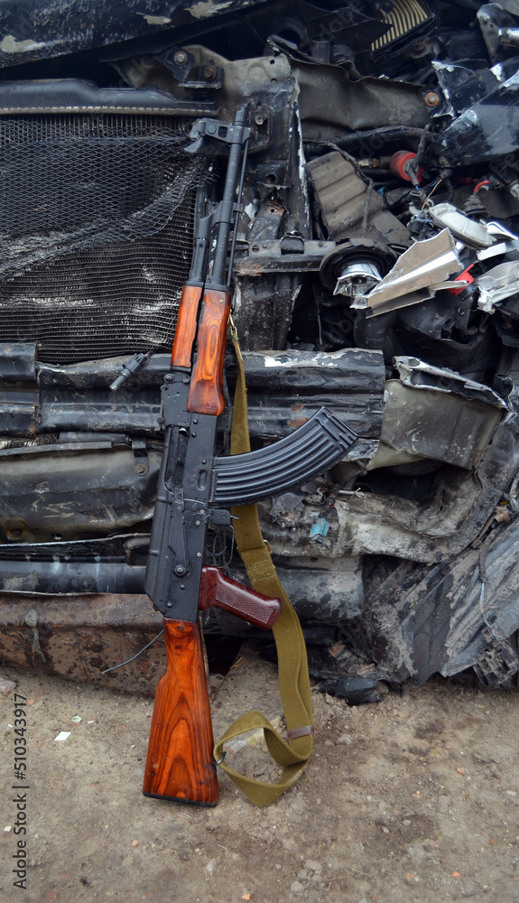 AKM(Avtomat Kalashnikova) version of Kalashnikov assault rifle and car ...