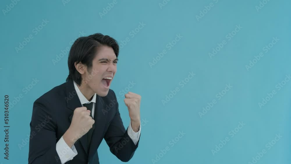 A business man is insanely overjoyed after successfully submitting a ...