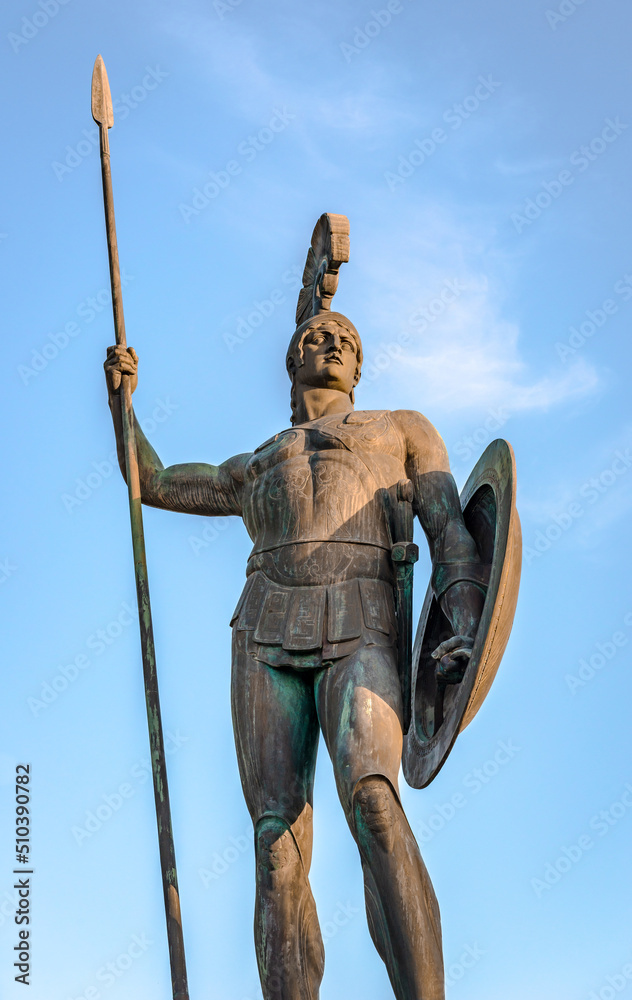 The statue of Achilles in full hoplite uniform, sanding as guardian of ...
