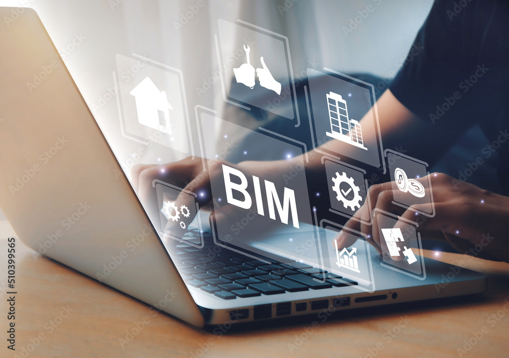 BIM. Engineer's hands using computers. building information modeling ...