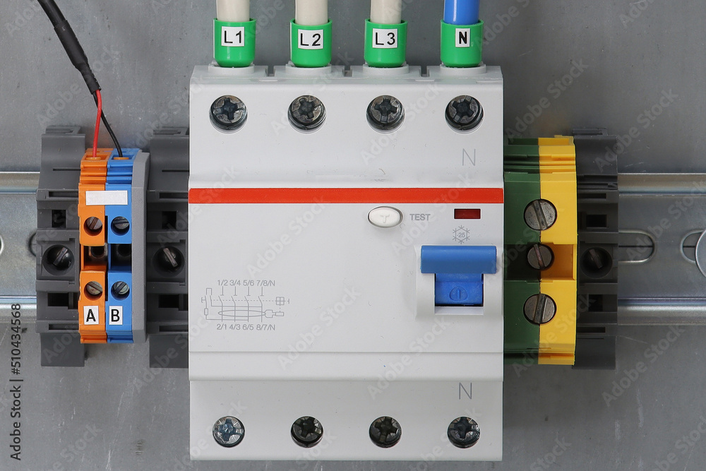 Automatic current switches installed in the electrical panel to protect ...