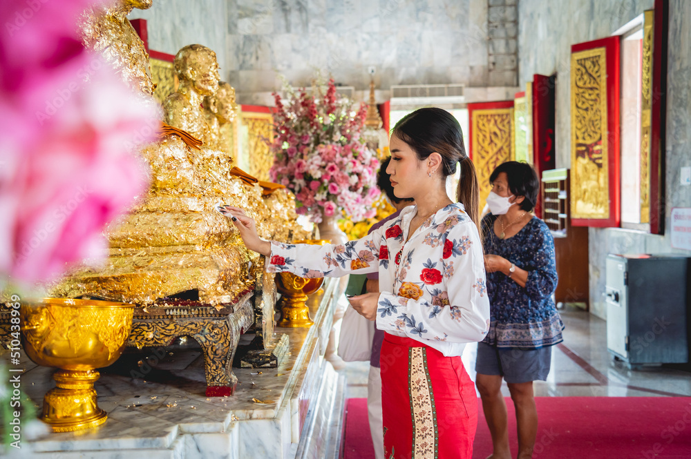 Beautiful Asian girl at big Buddhist temple dressed in traditional ...