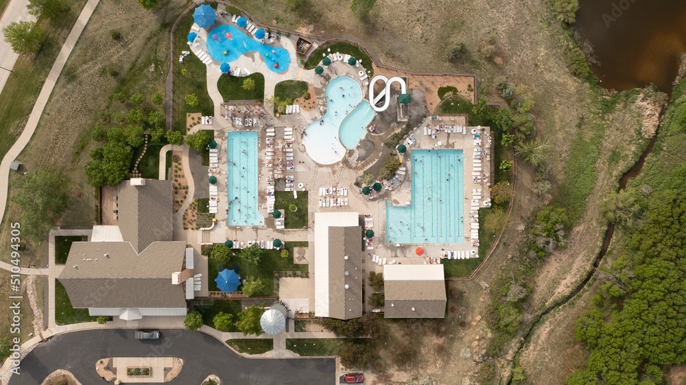 Suburban community amenities lap pool, kiddie pool and splash park with ...